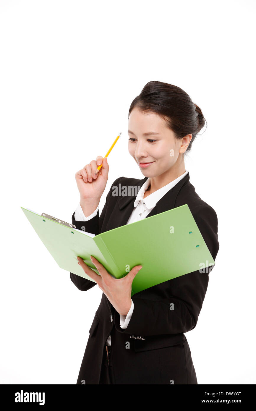 young woman posing in studio binder Stock Photo - Alamy