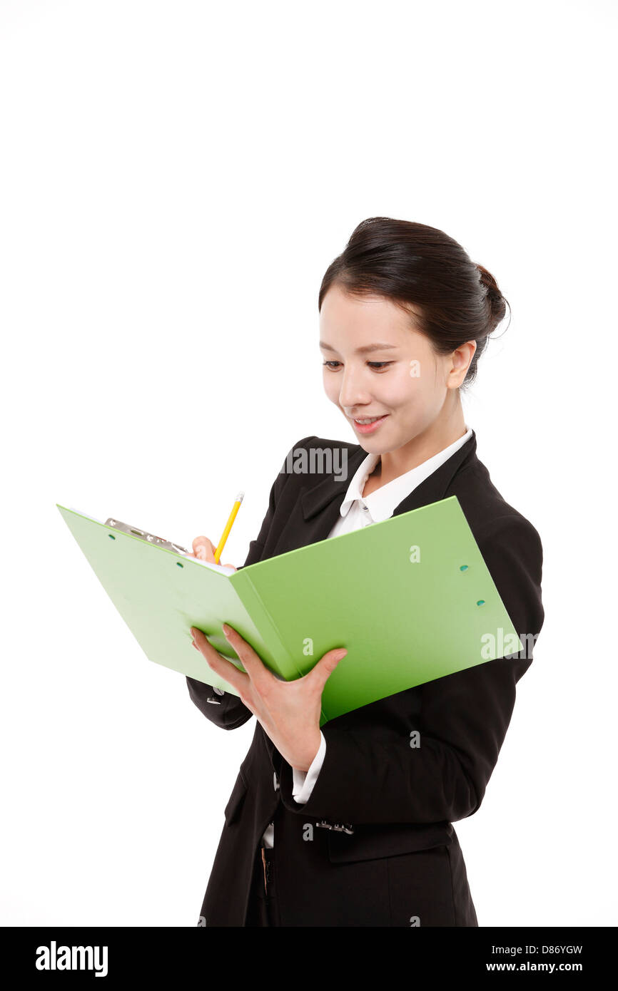 young woman posing in studio binder Stock Photo - Alamy