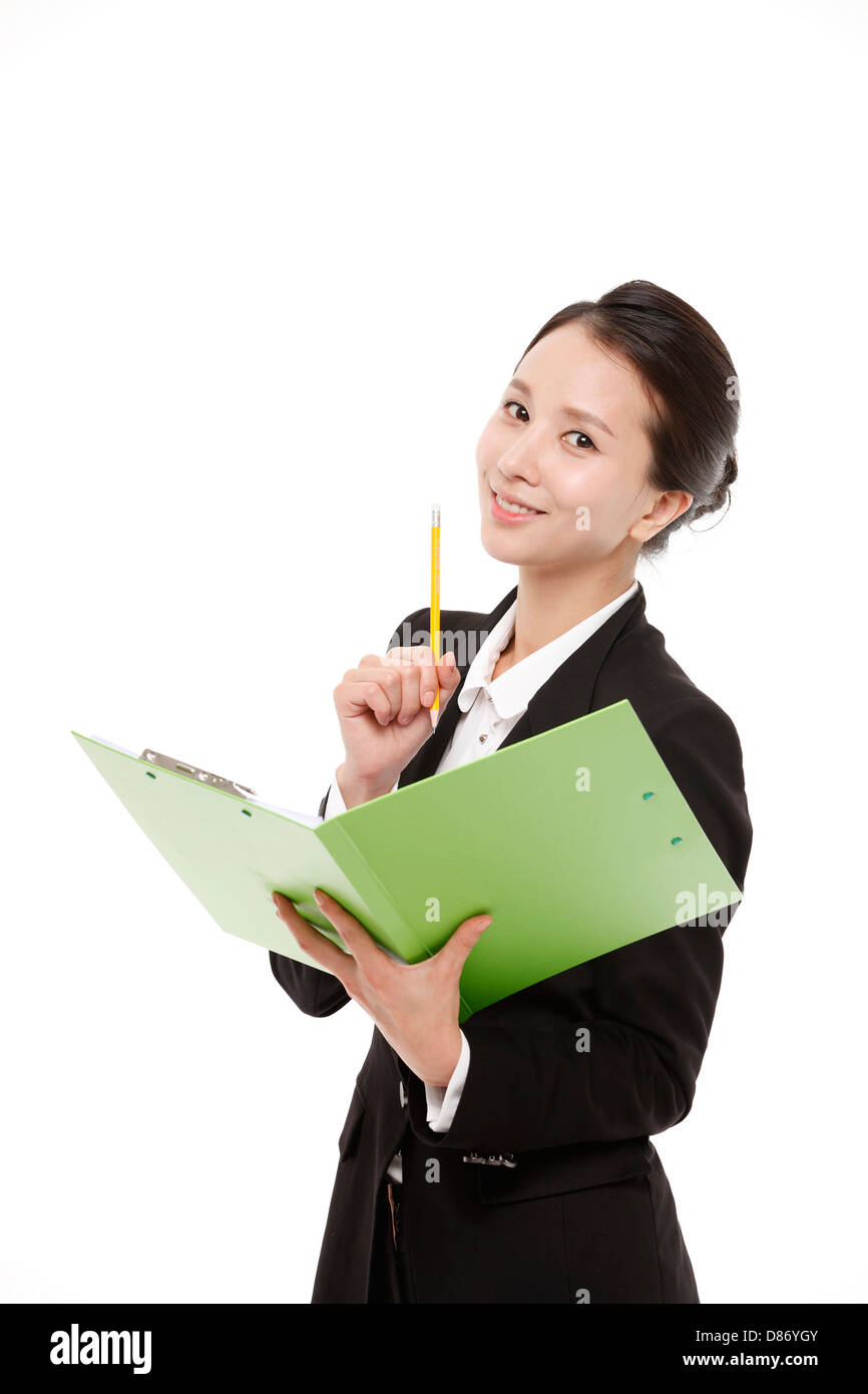 young woman posing in studio binder Stock Photo - Alamy
