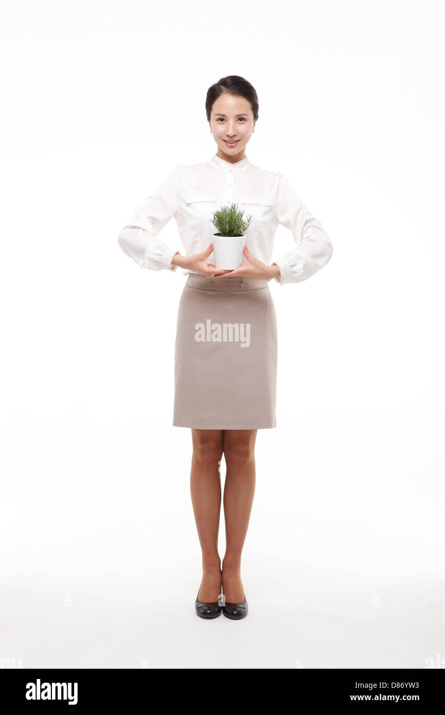 young woman posing potted plant Stock Photo - Alamy