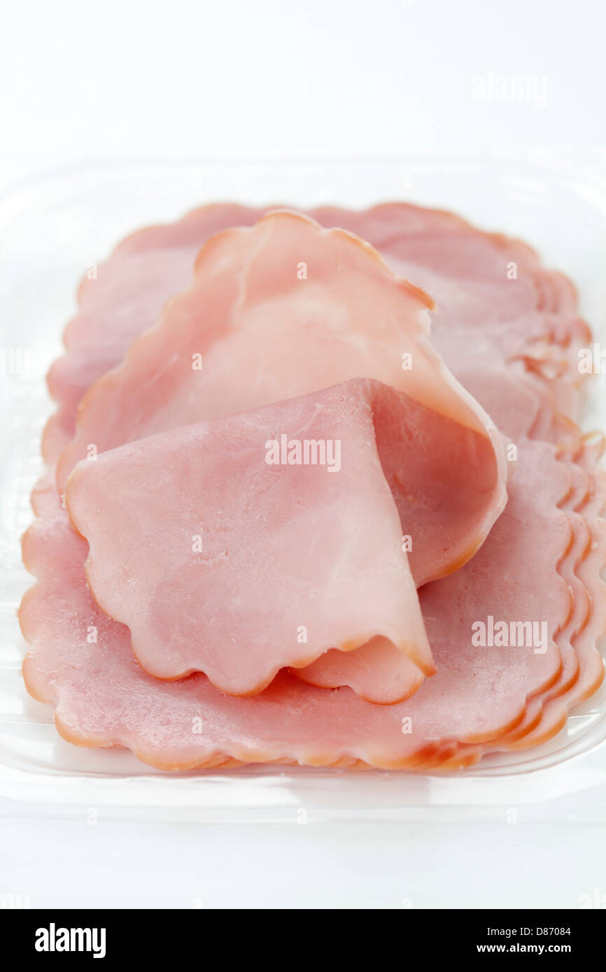 Boiled ham in plastic tray, close up Stock Photo - Alamy