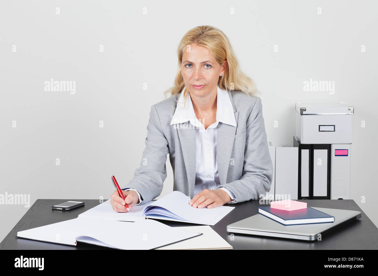 Looking camera people working Cut Out Stock Images & Pictures - Alamy