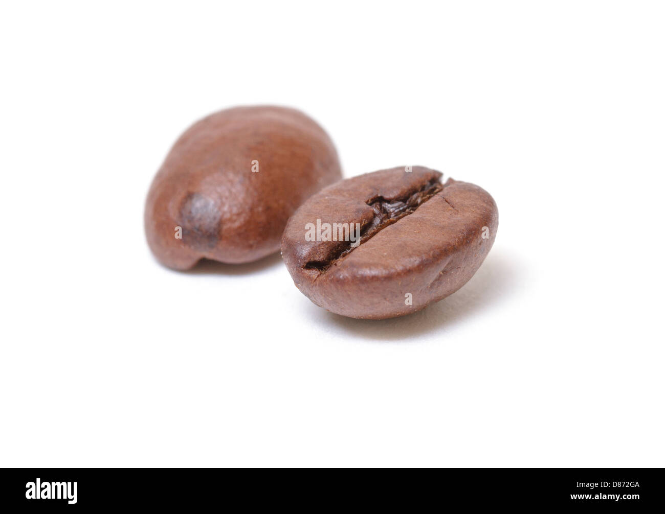 Coffee beans closeup, isolated on white background Stock Photo - Alamy