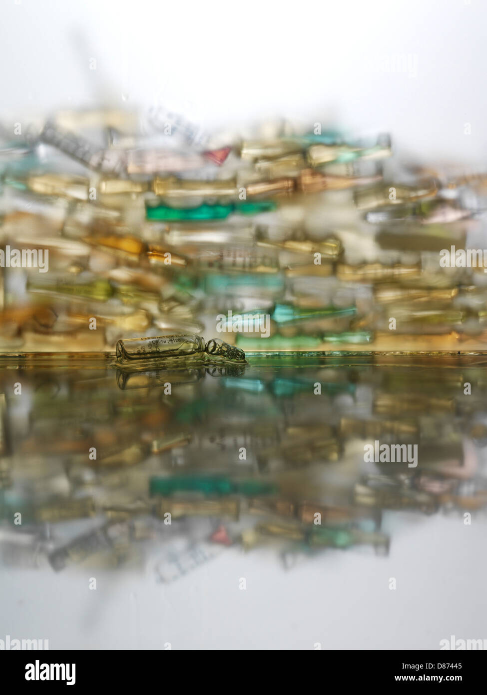 Broken cosmetics vials, close up Stock Photo - Alamy