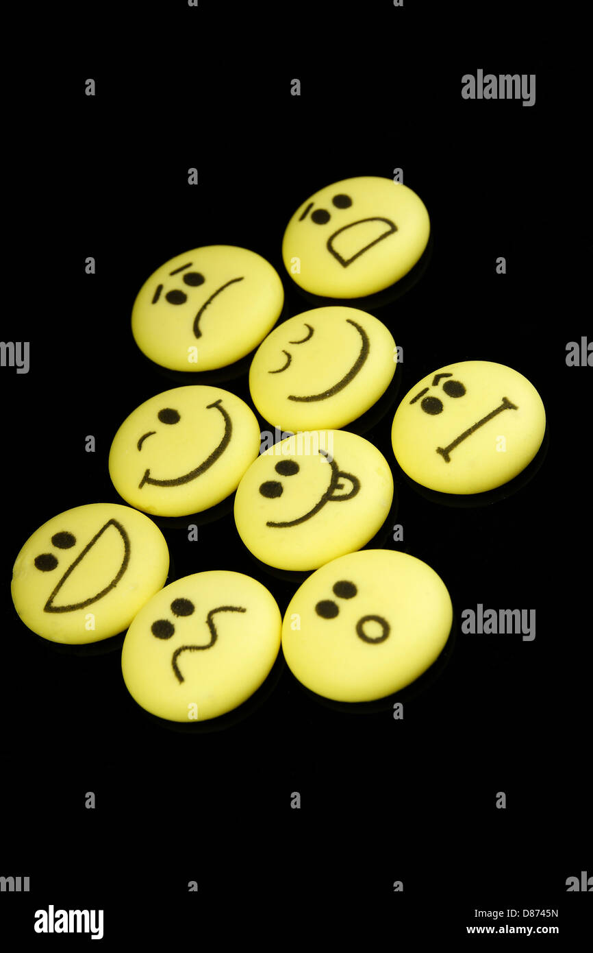 Anthropomorphic Faces on black background, close up Stock Photo - Alamy
