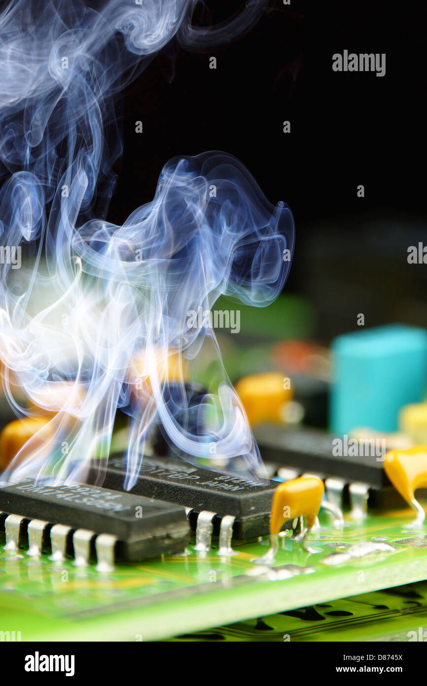 Smoke over electrical component on black background, close up Stock ...