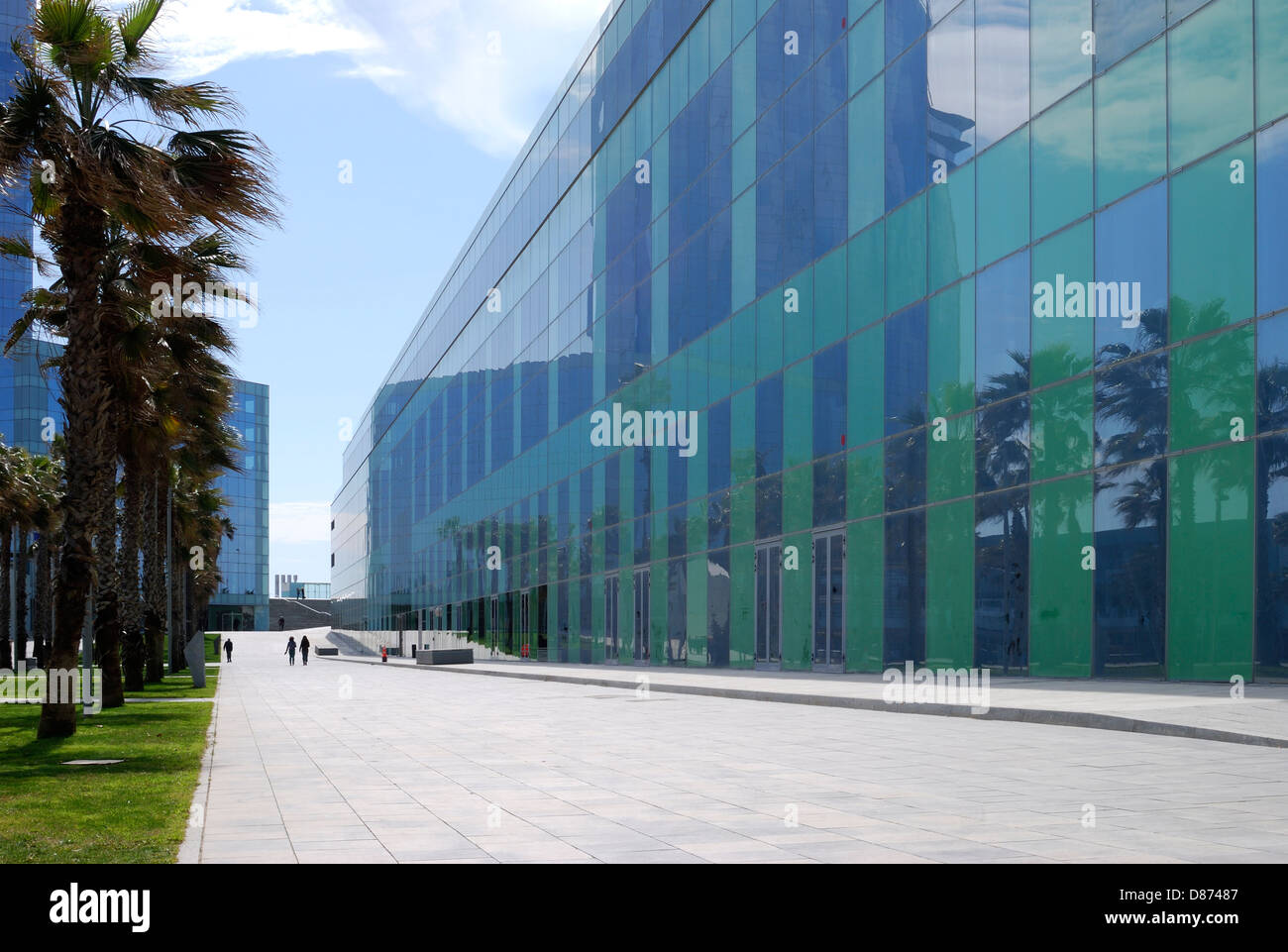 Modern glass and steel office building on seafront near harbour at ...