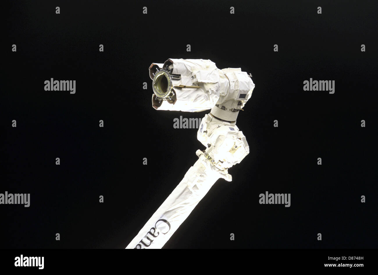 STS-108 mission captures the end effector of the Canadarm2 robotic arm ...