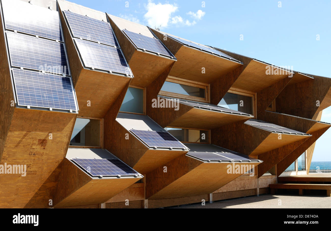 Building displaying solar power technology by marina at Barceloneta ...