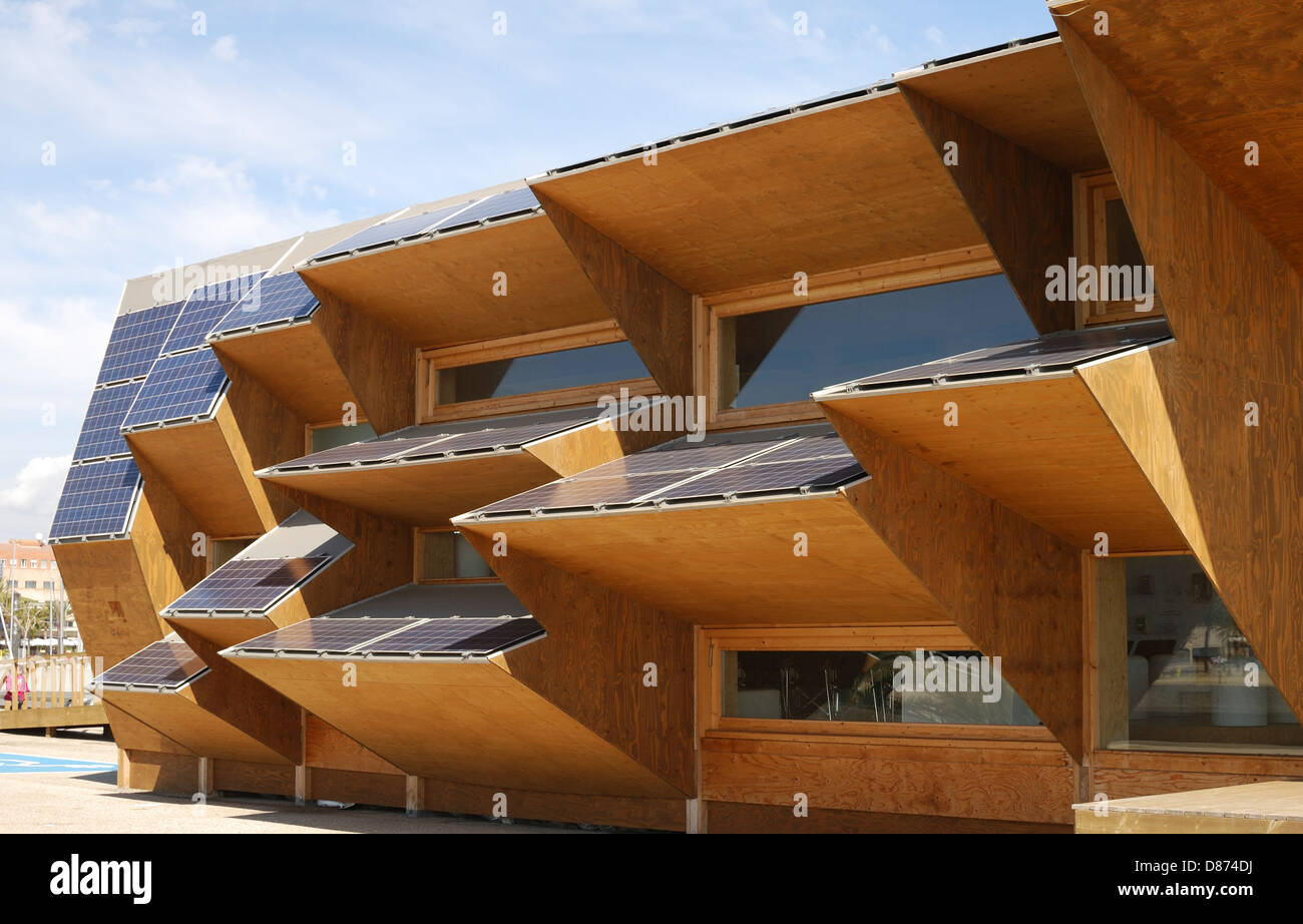 Building displaying solar power technology by marina at Barceloneta ...