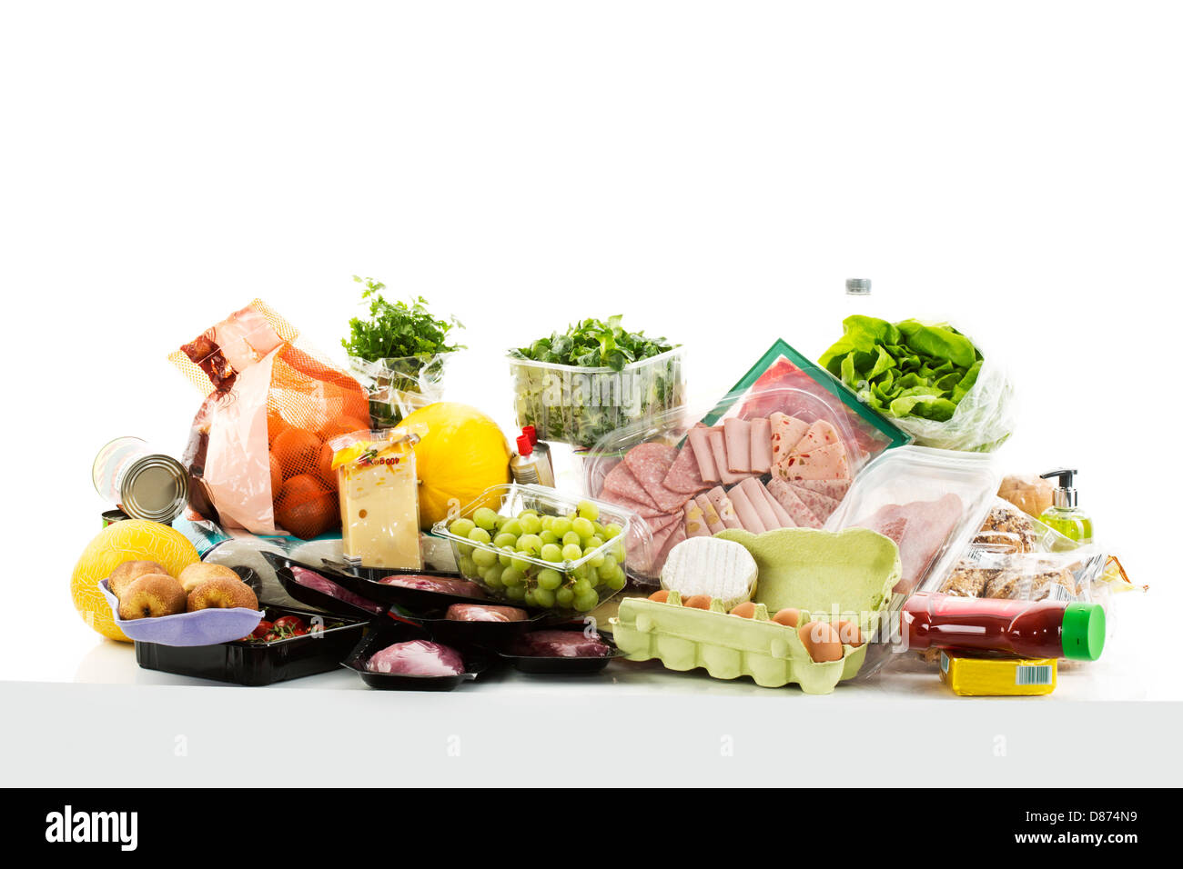 Various groceries on white background Stock Photo - Alamy