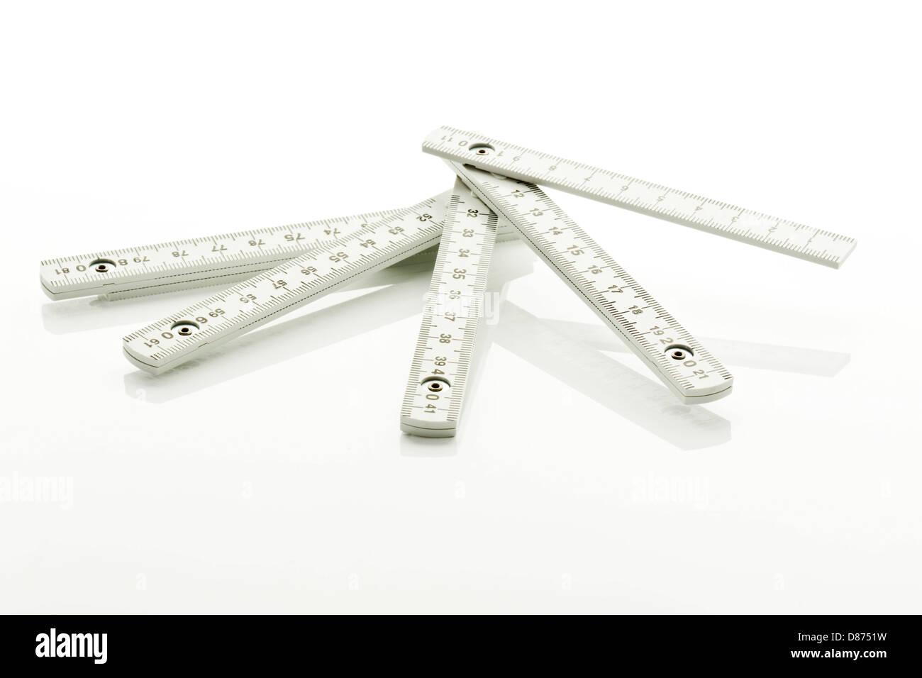 Folding ruler on white background, close up Stock Photo - Alamy