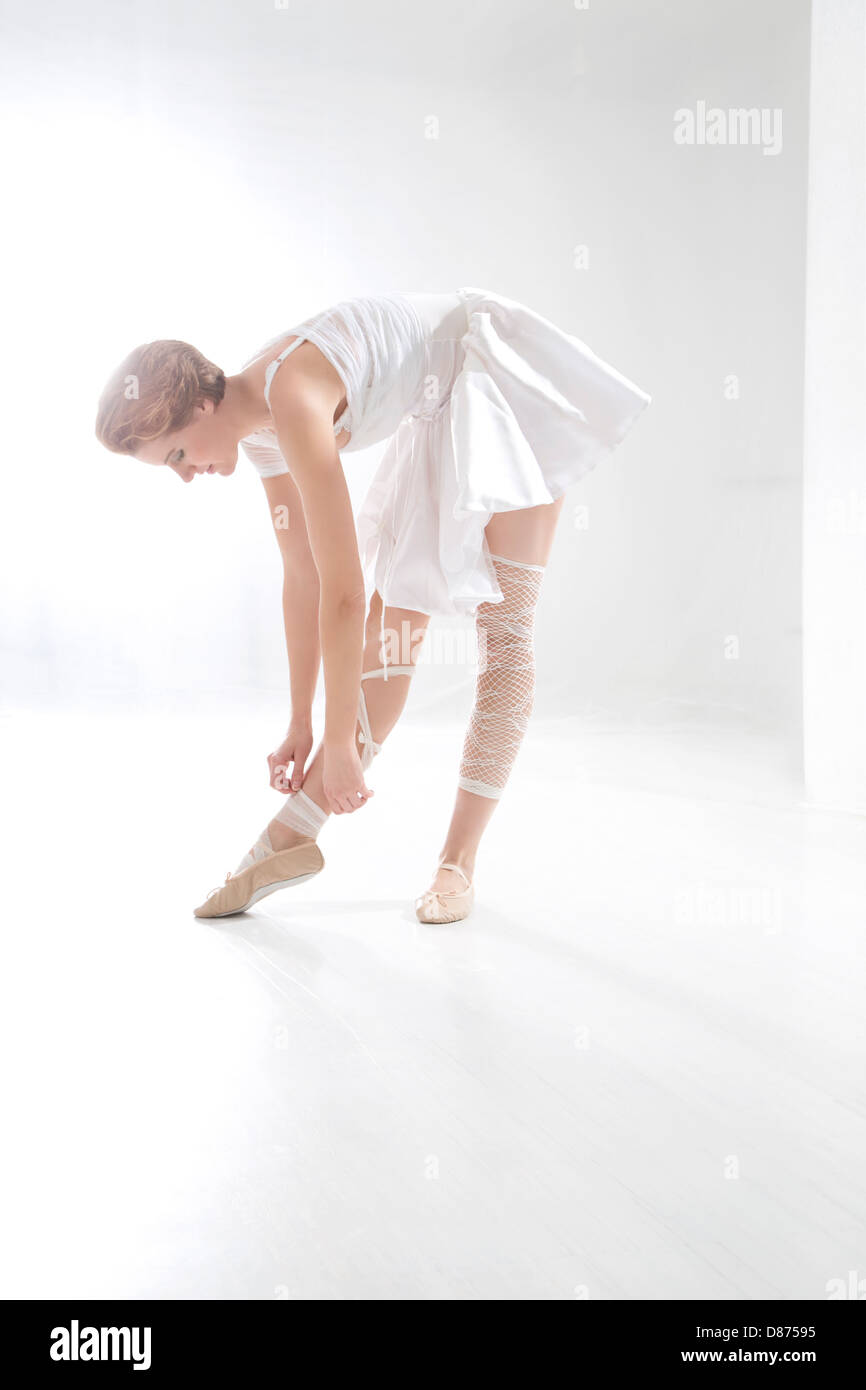 Young woman getting ready for ballet Stock Photo - Alamy