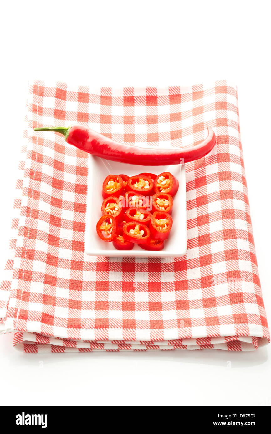 Tray of chopped red chilli pepper on white background, close up Stock ...