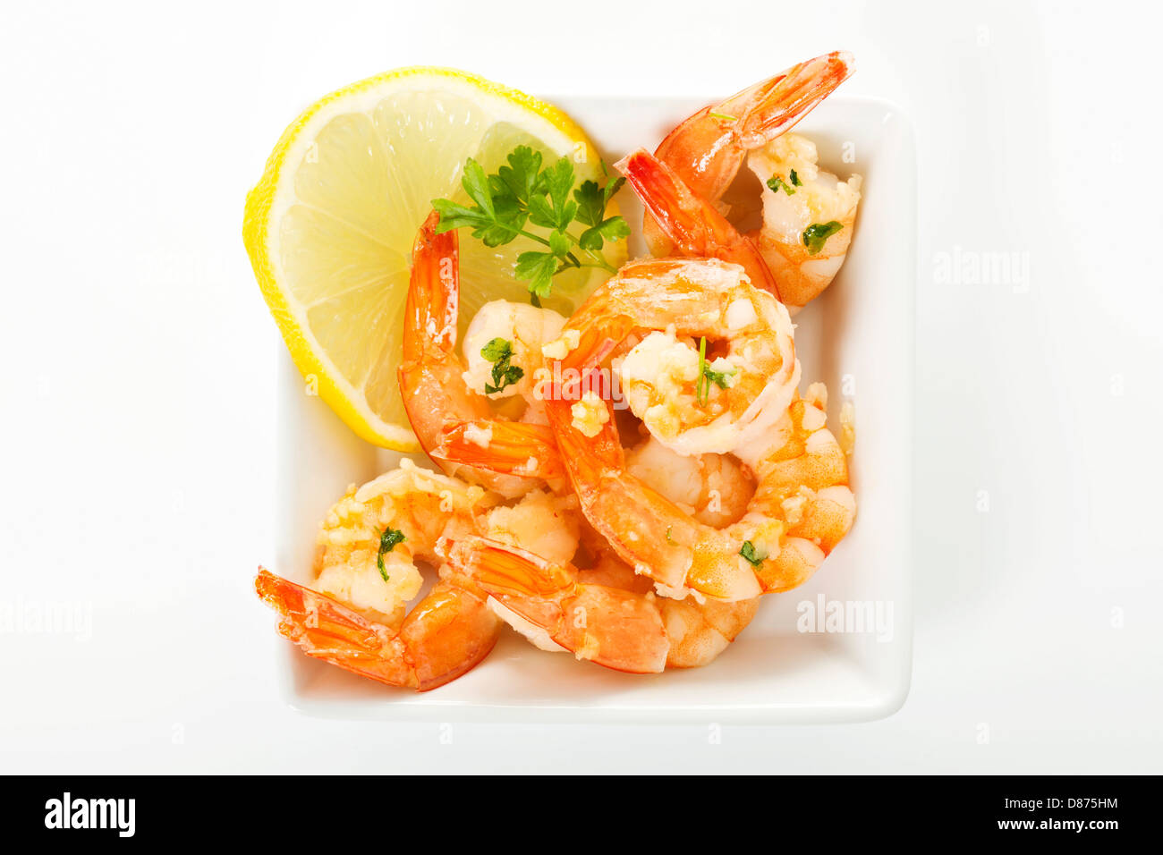 Plate of prawns on white background, close up Stock Photo - Alamy
