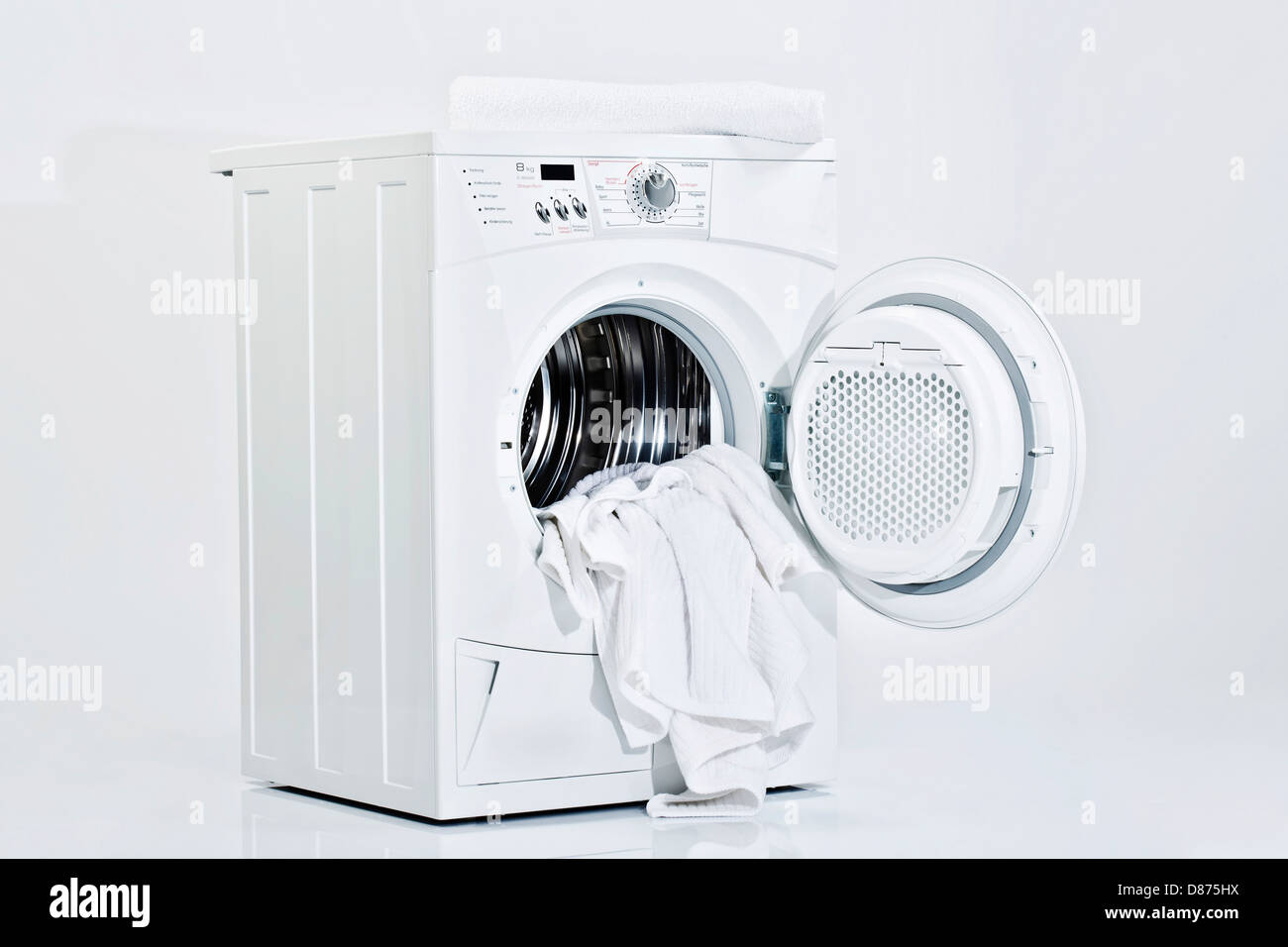 Washing machine on white background Stock Photo - Alamy