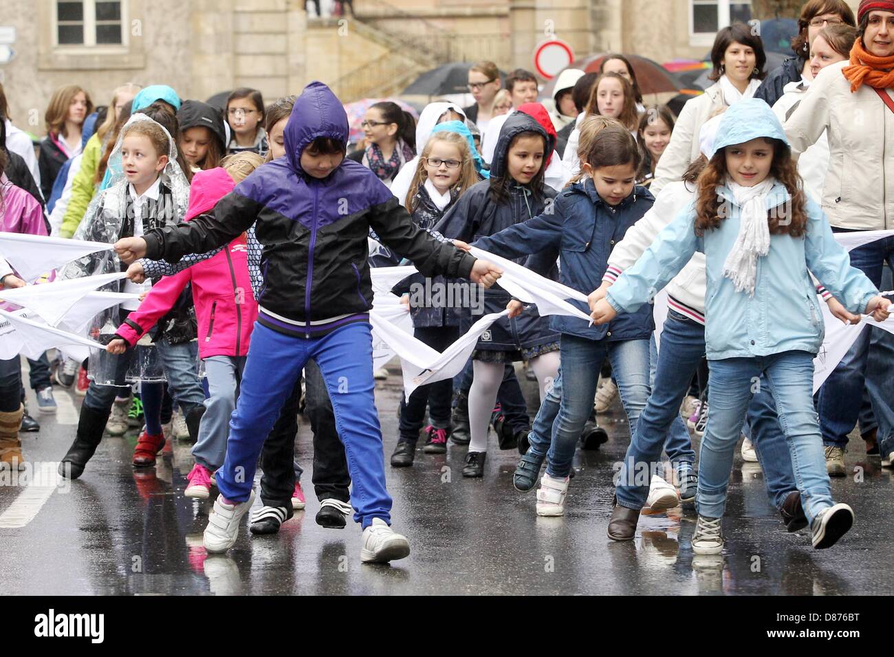 Participants in the dancing procession of Echternach hop through the ...