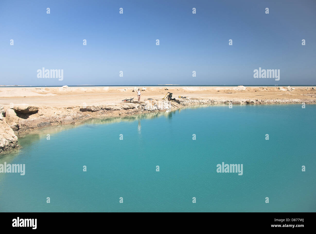 Amazing Blue lake among the sand and rocks Stock Photo - Alamy