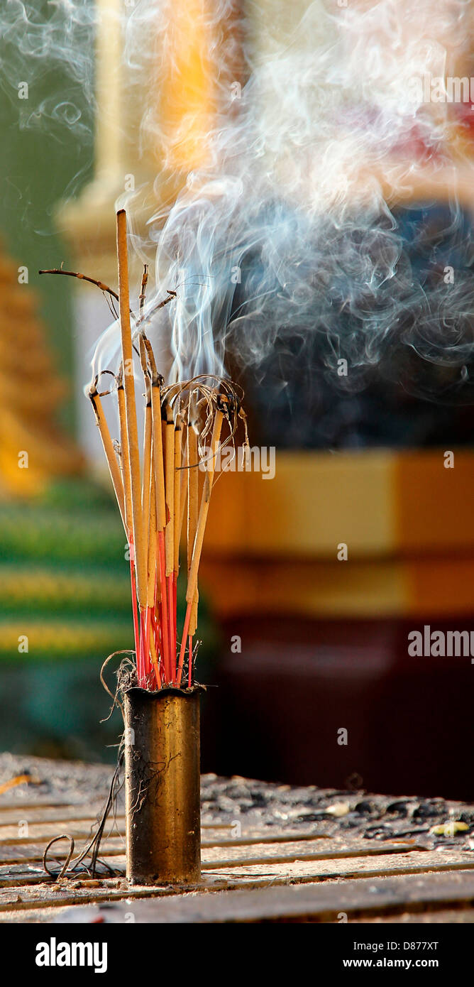 Myanmar, Burning incense sticks at Shwedagon Pagoda Stock Photo - Alamy