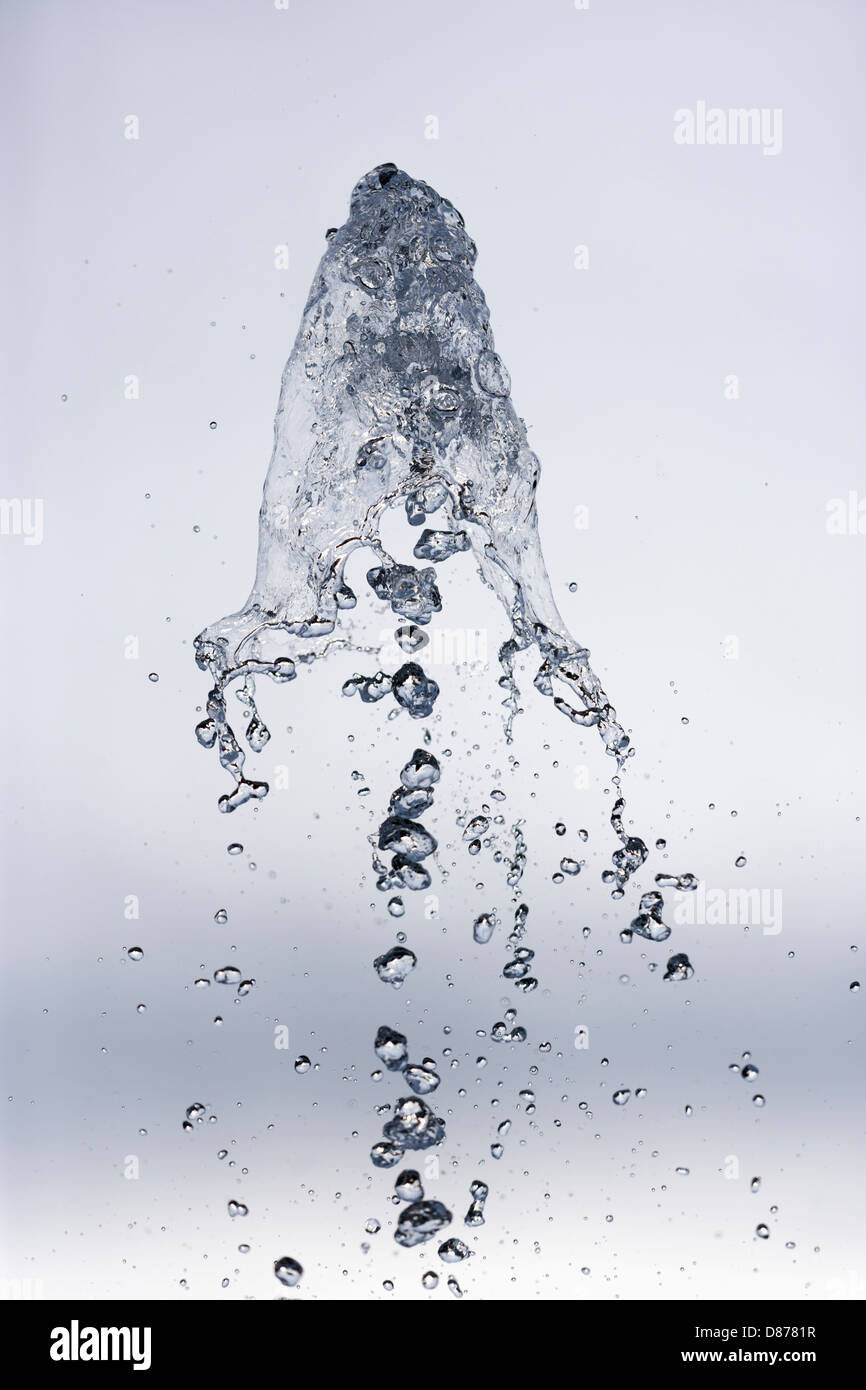 Splashing water against white background Stock Photo - Alamy