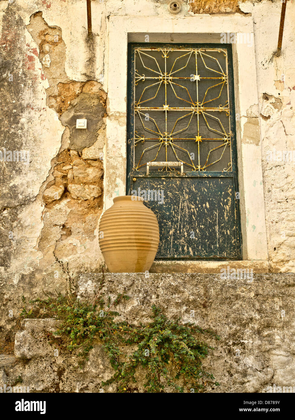 The traditional old Greek house with an open staircase and artistic ...