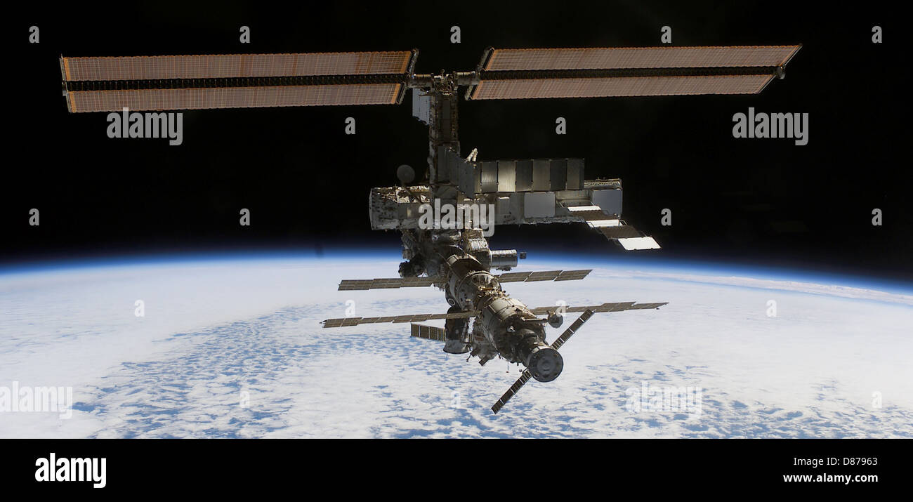 The International Space Station (ISS) in October 2002, showcasing its ...