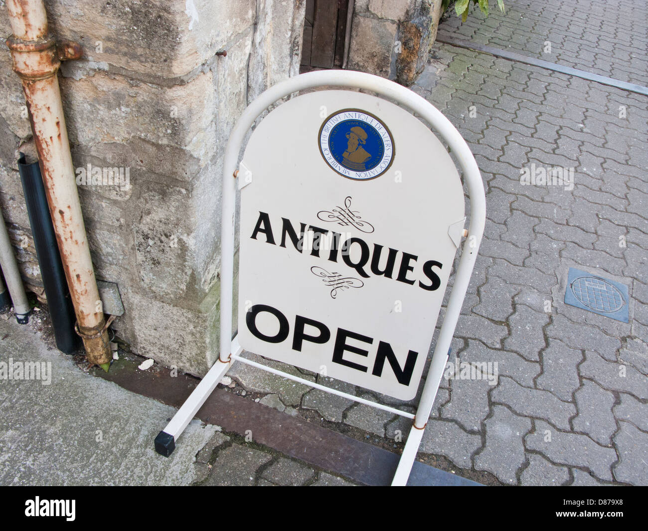 Open sign by Antiques retailer, UK Stock Photo - Alamy