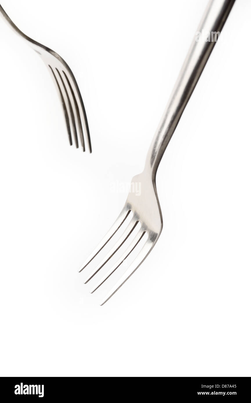 Metal fork on white background Stock Photo - Alamy