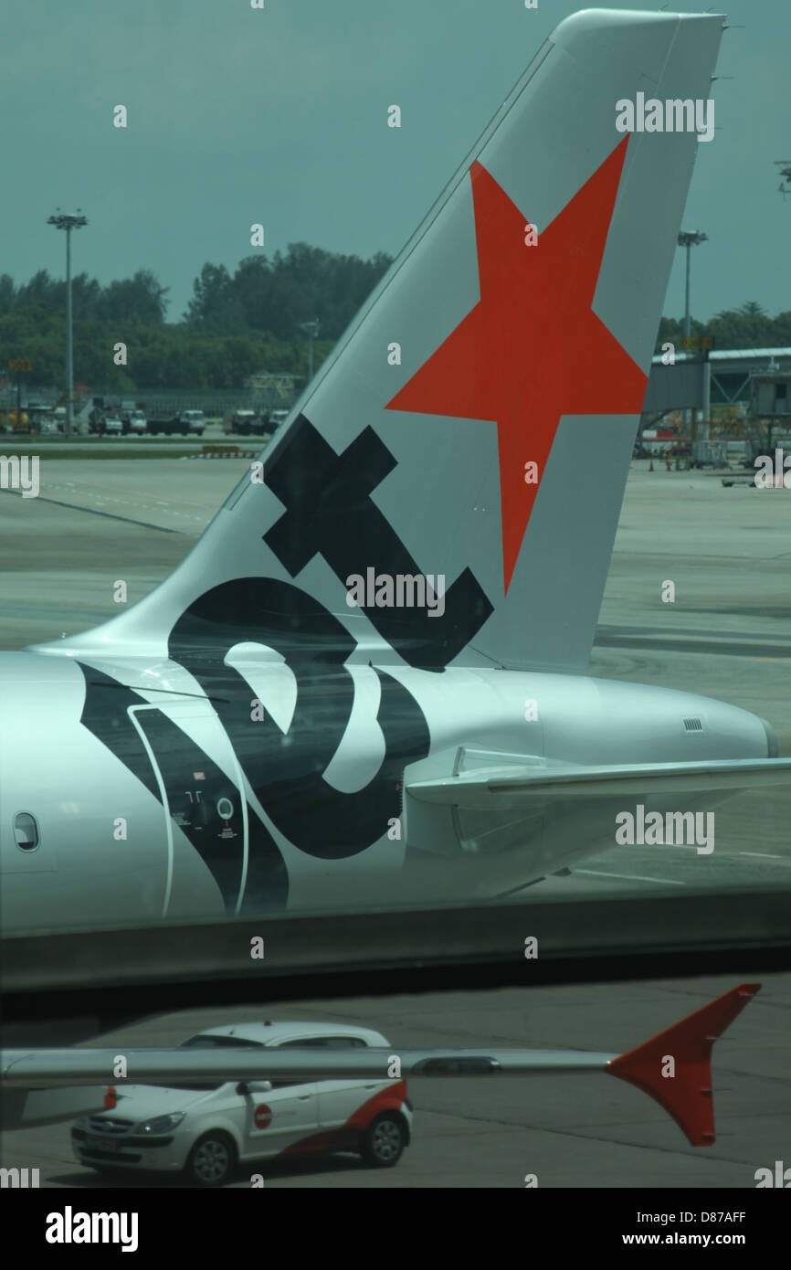 Jetstar plane changi airport livery aviation Stock Photo - Alamy