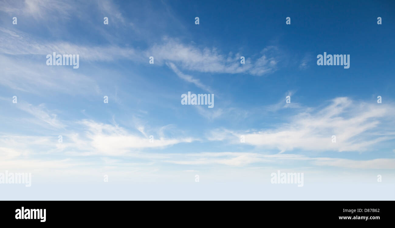 Wind cloudy blue sky horizontal background texture Stock Photo - Alamy