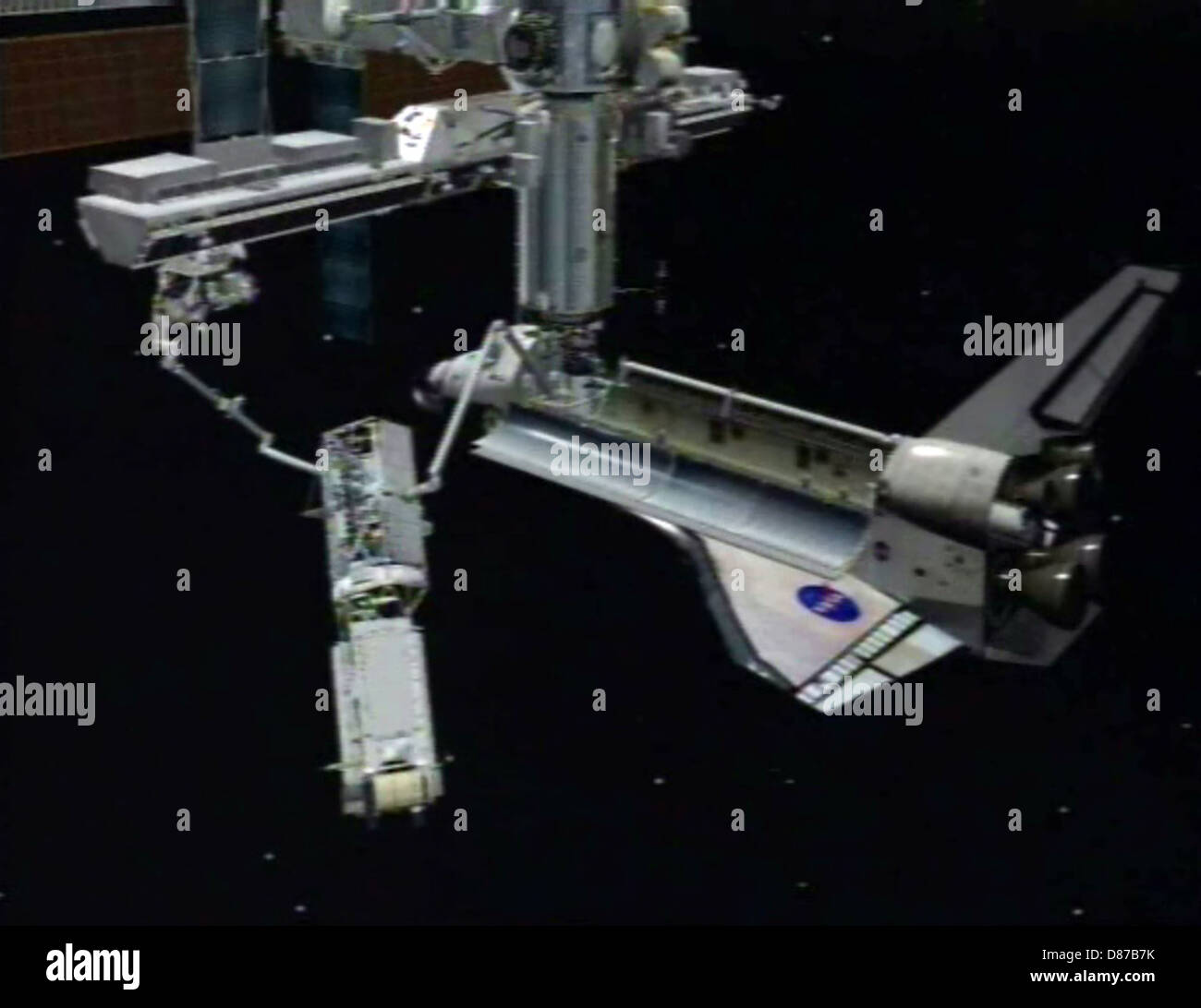 NASA astronauts perform the truss handoff during the STS-115 mission ...