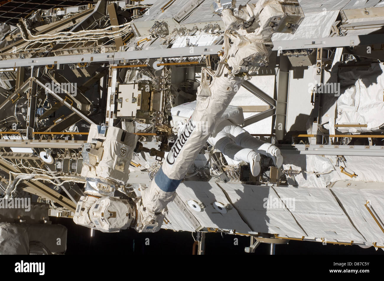 Robert Satcher performs an EVA (Extravehicular Activity) during the STS ...