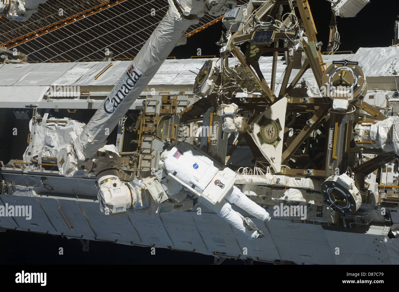 NASA astronaut Robert Satcher performs an extravehicular activity (EVA ...
