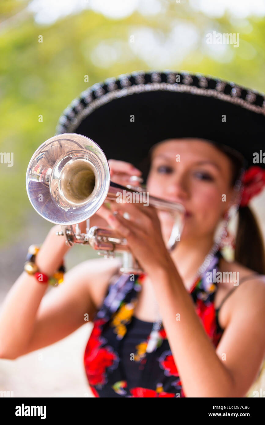 Woman playing trumpet hi-res stock photography and images - Alamy