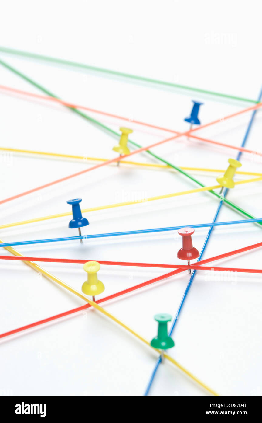 Network with pins on white background, close up Stock Photo - Alamy