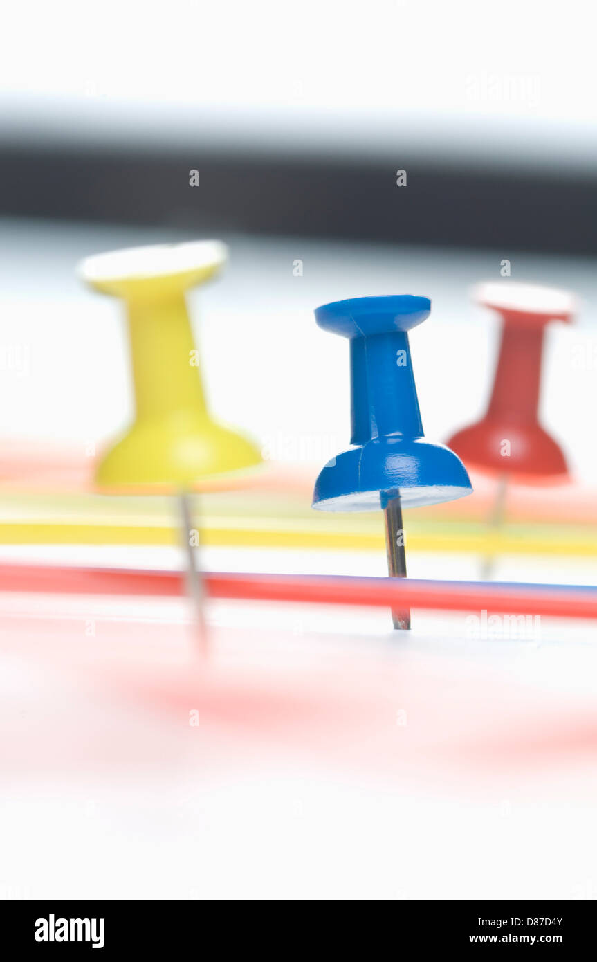 Network with pins on white background, close up Stock Photo - Alamy