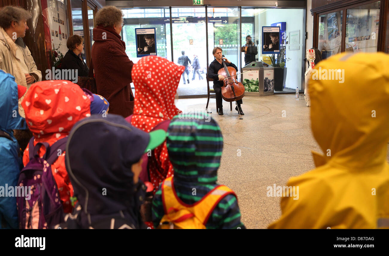 Cellist Alban Gerhardt performs in Dammtor Station in Hamburg, Germany ...