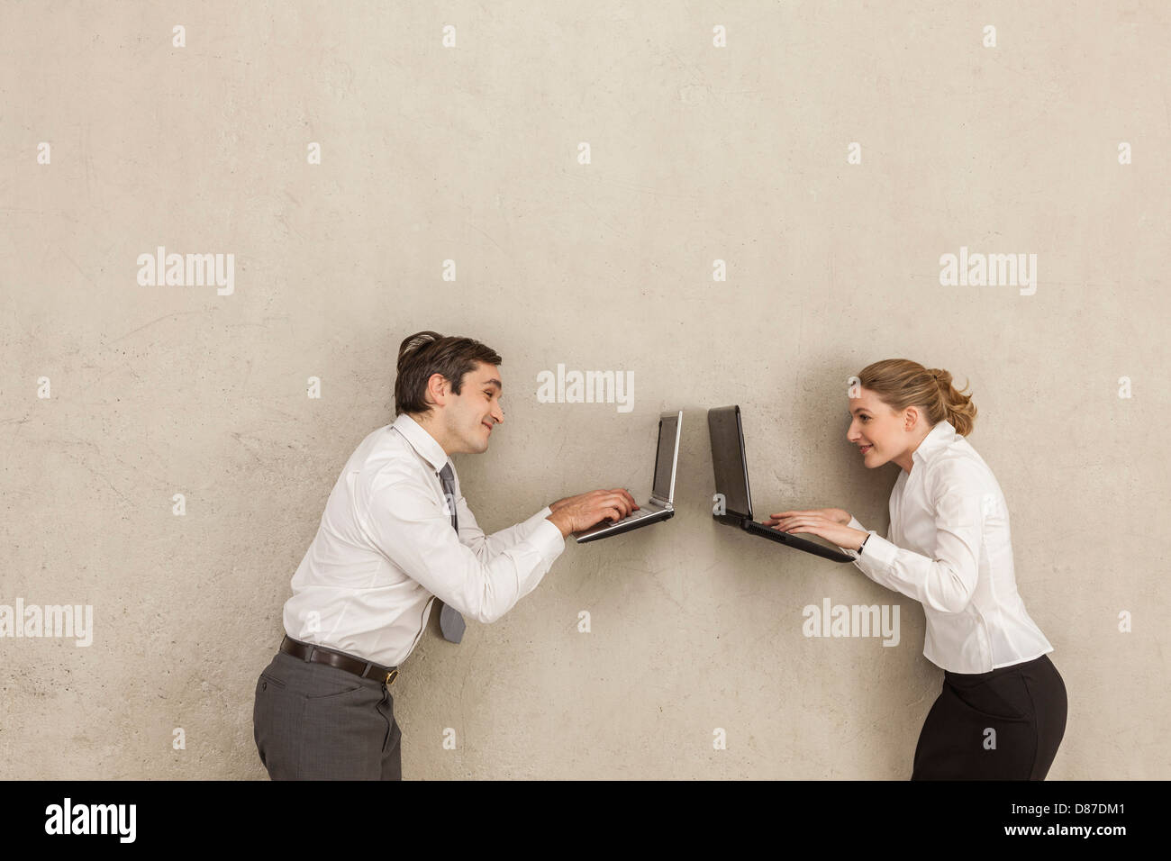 Business people using laptops Stock Photo - Alamy