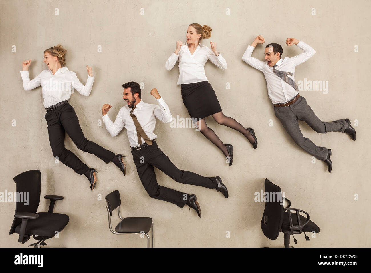 Business people jumping in office Stock Photo - Alamy