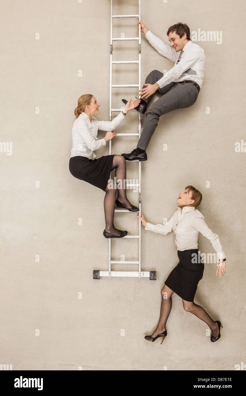Business people climbing ladder Stock Photo - Alamy