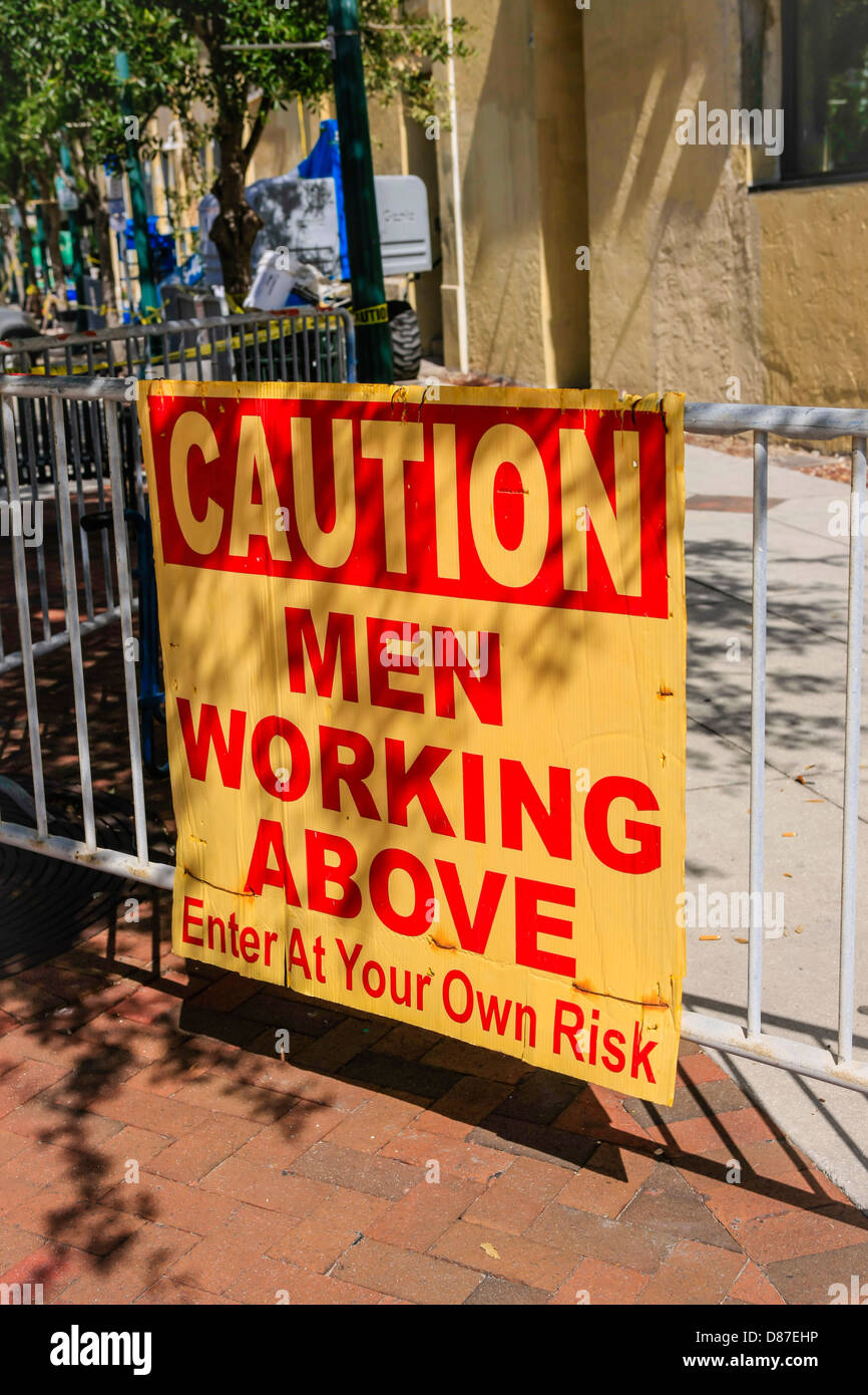 Streets Sign - Caution Men Working Above Stock Photo - Alamy