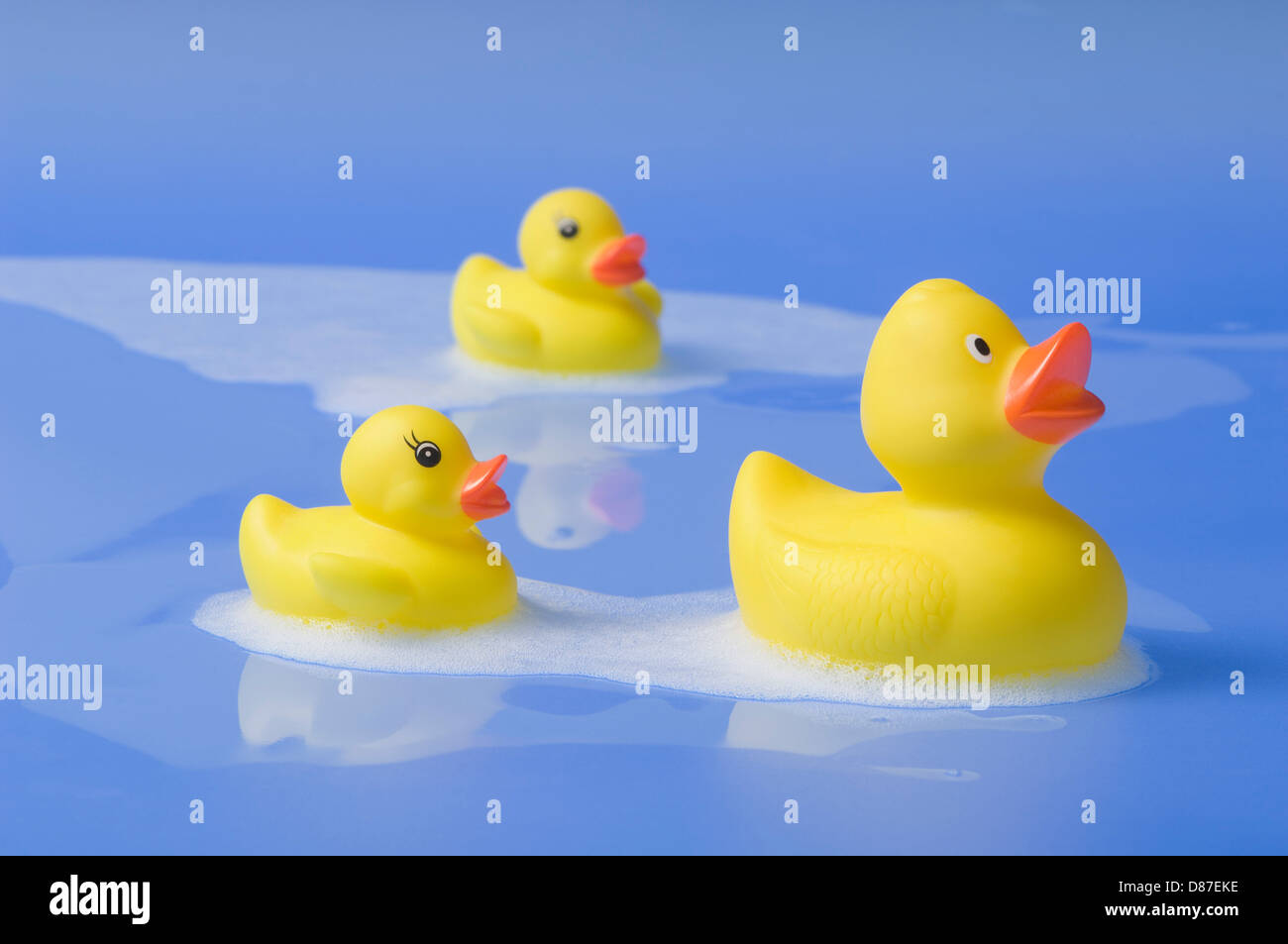 Rubber duck toy floating in water Stock Photo - Alamy
