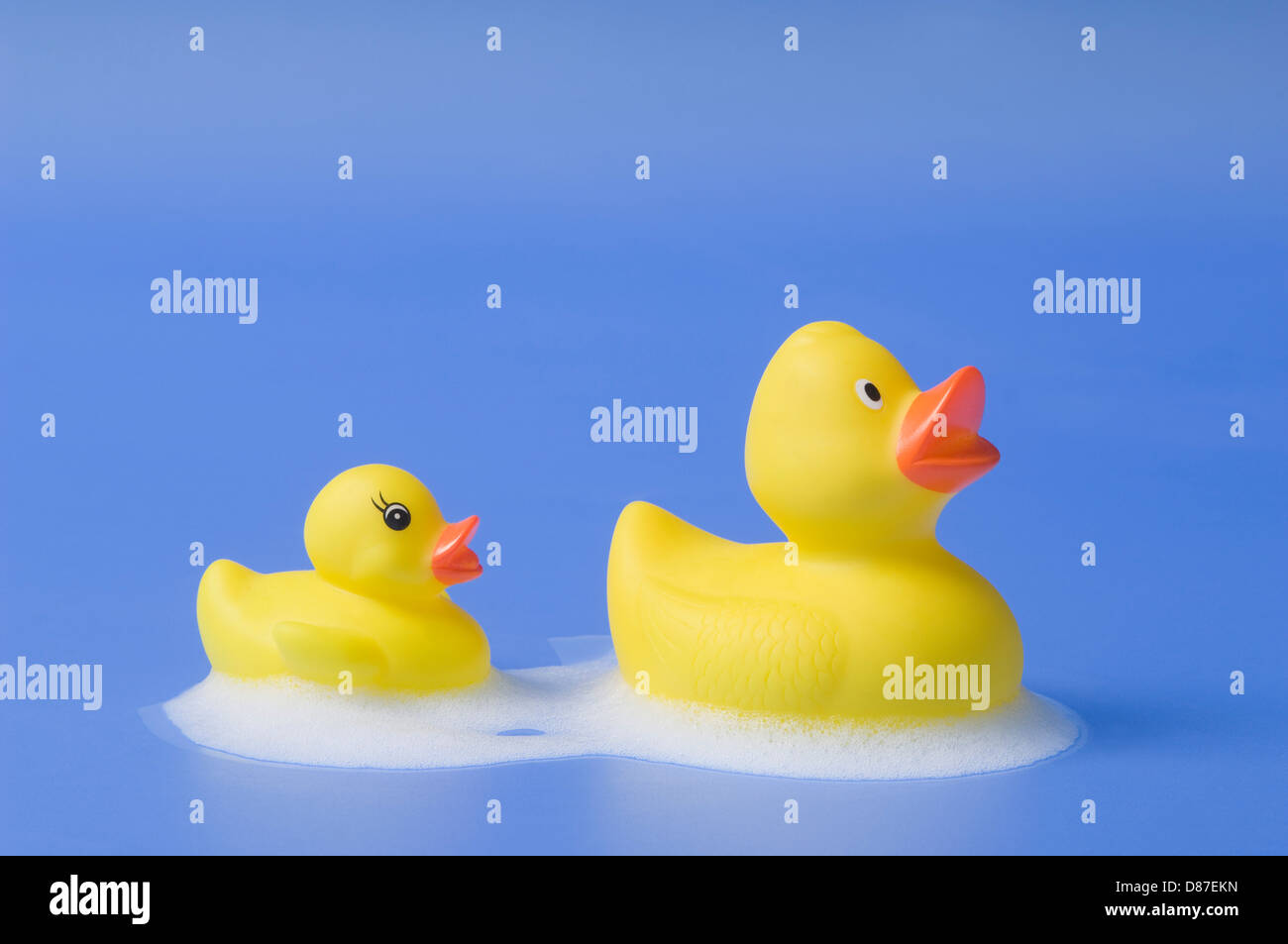 Rubber duck toy floating in water Stock Photo - Alamy