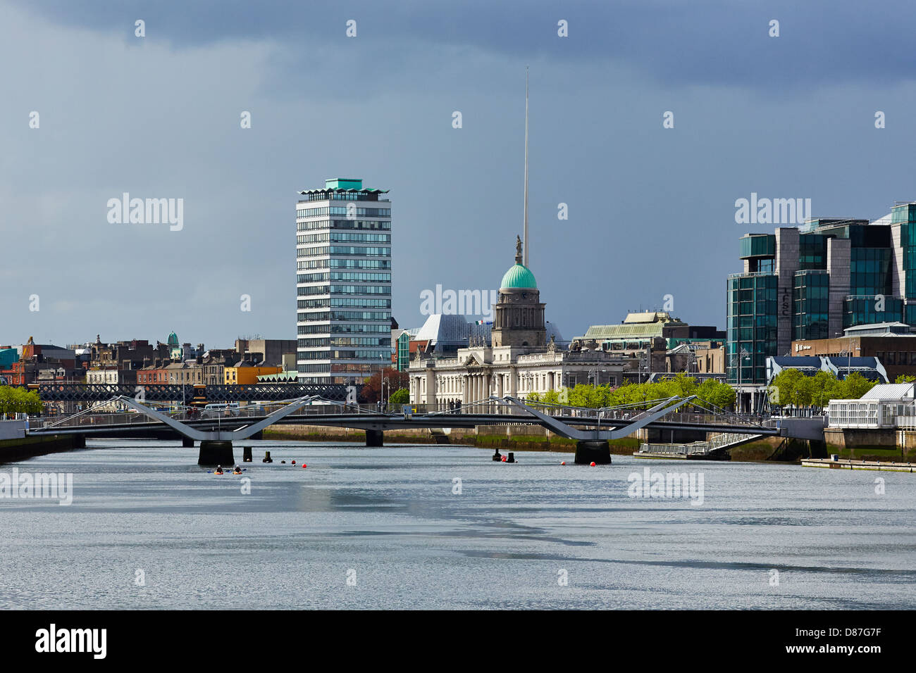 The River Liffey with the Custom House the Liberty Hall building and ...