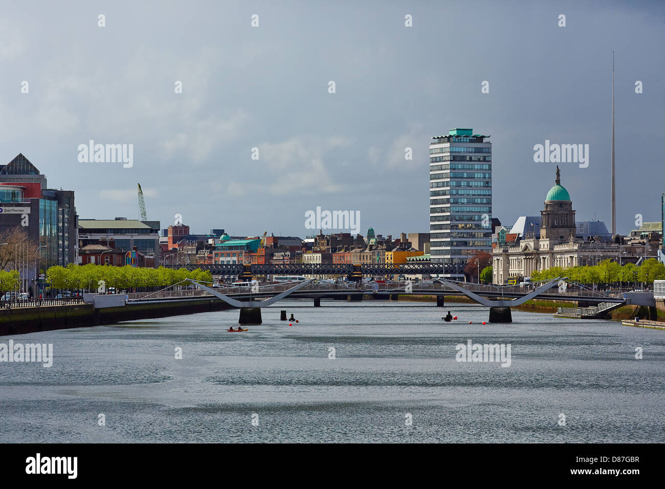The River Liffey with the Custom House the Liberty Hall building and ...