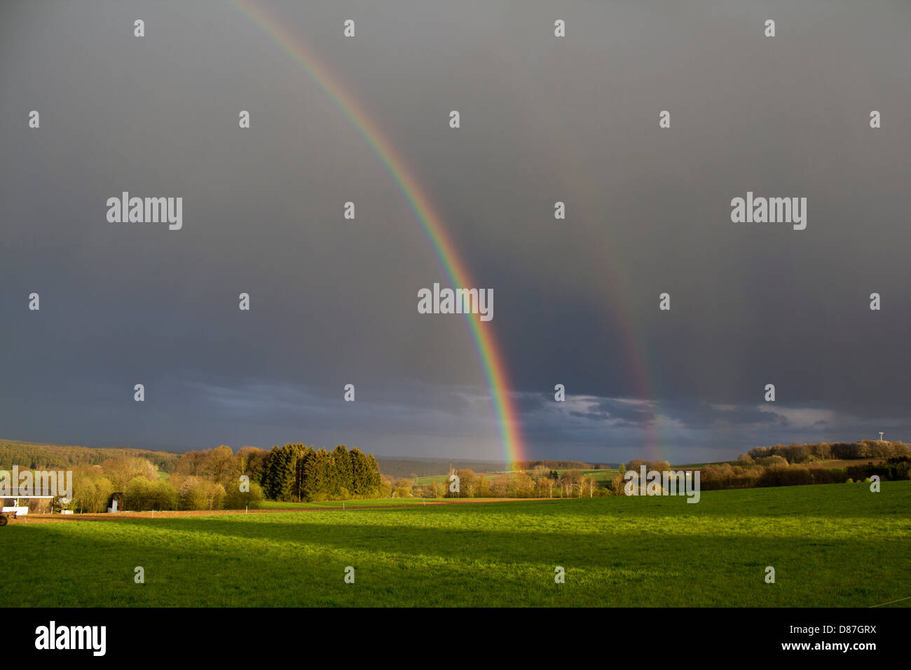 Europe, Germany, Rhineland-Palatinate, View of rainbow at rural ...