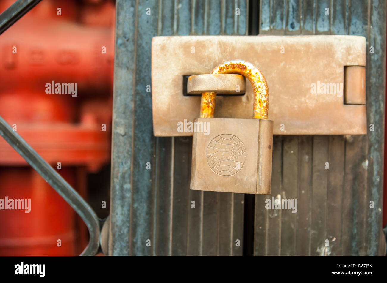 Old and rusted lock outside the building Stock Photo - Alamy