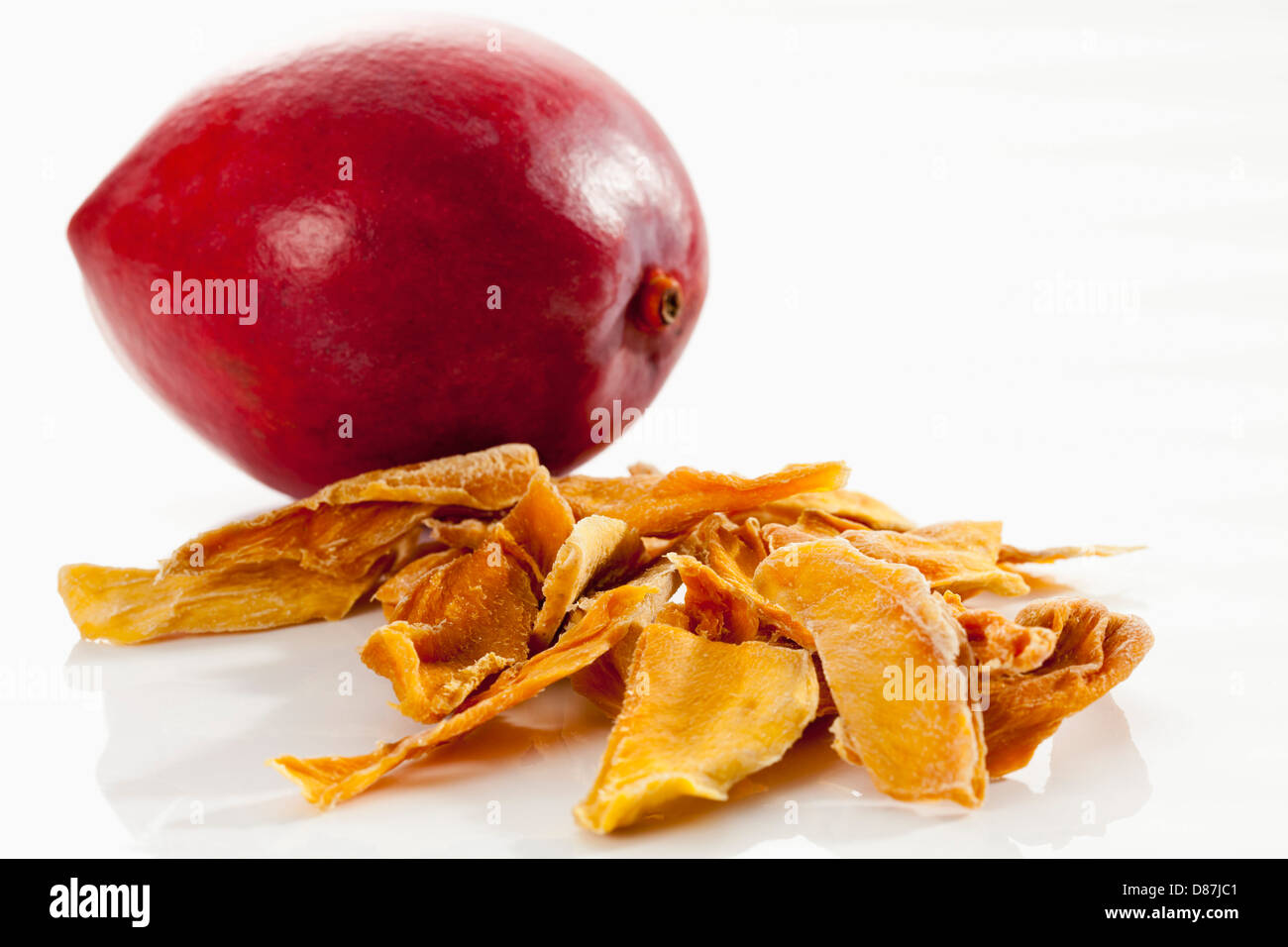 Dried and fresh mango fruit on white background, close up Stock Photo ...