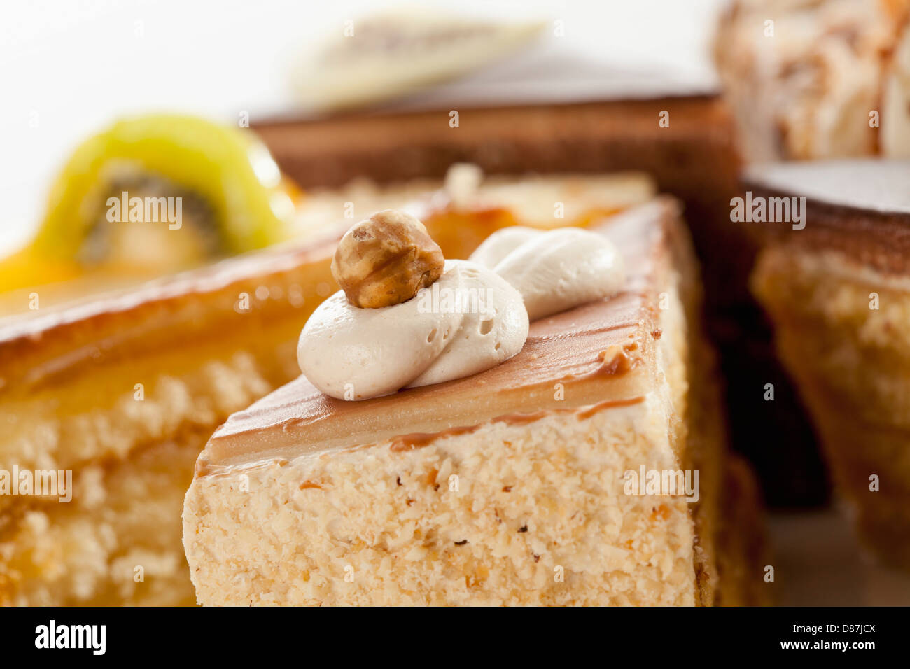 Variety of cakes on plate, close up Stock Photo - Alamy