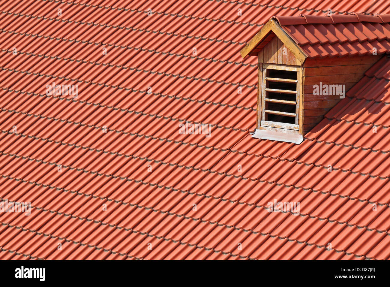 garret window on red tiled roof Stock Photo - Alamy